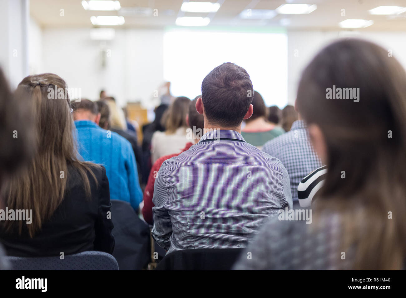 Woman giving presentation on business conference Stock Photo - Alamy