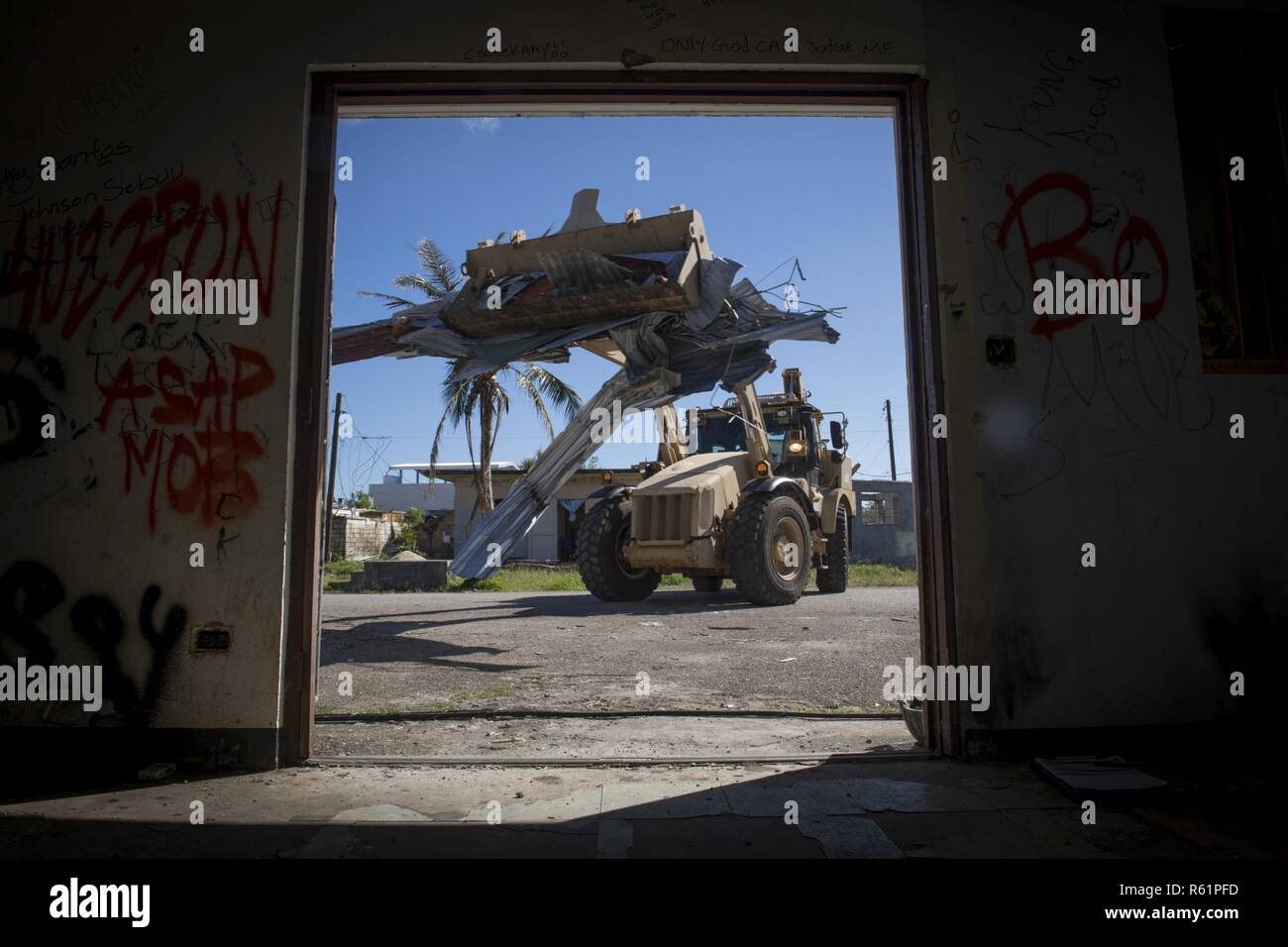 Pvt. Joseph Mafnas, 1224th Engineer Support Company, uses a high ...