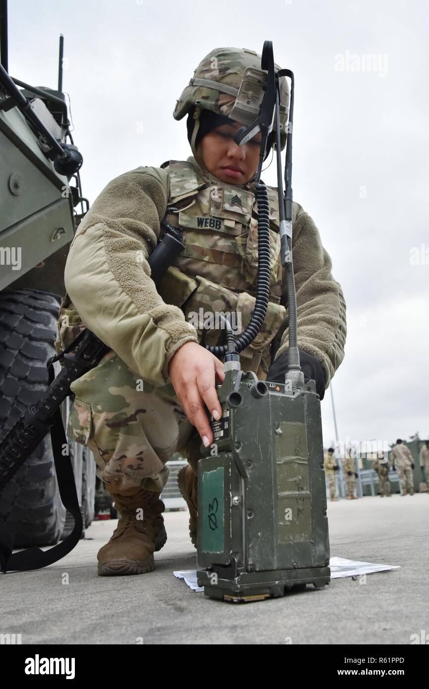 U.S. Army Sgt. Jessica Webb, left, assigned to Regimental Support ...