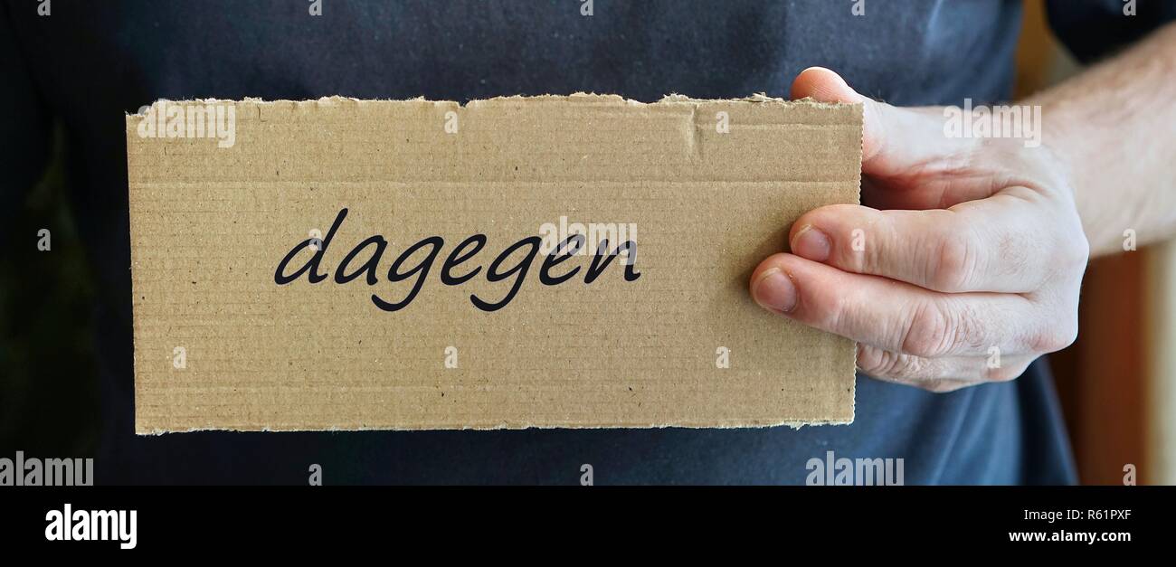 cardboard sign reading Stock Photo - Alamy