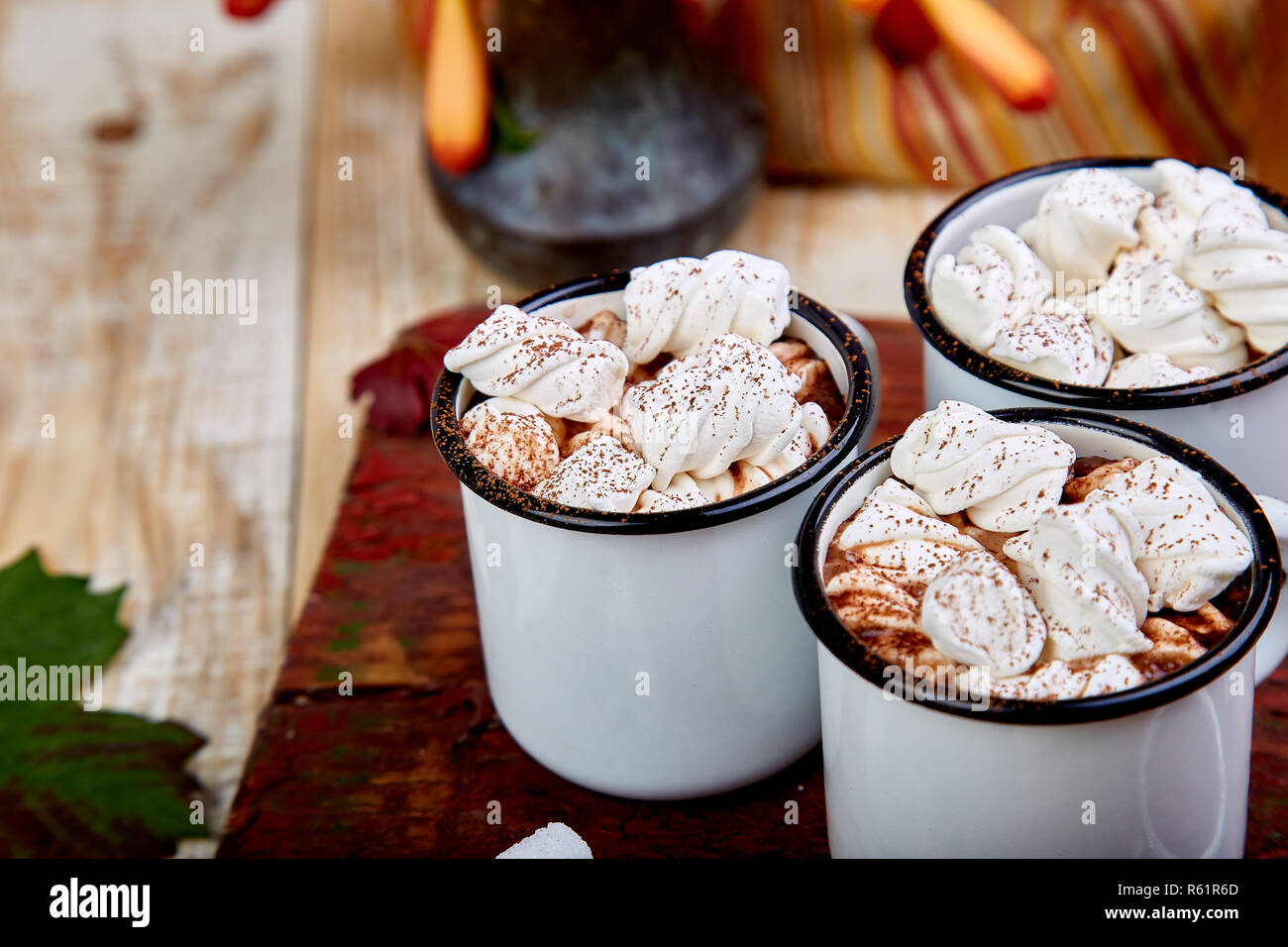 Hot chocolate with marshmallow candies on wooden background. Winter ...