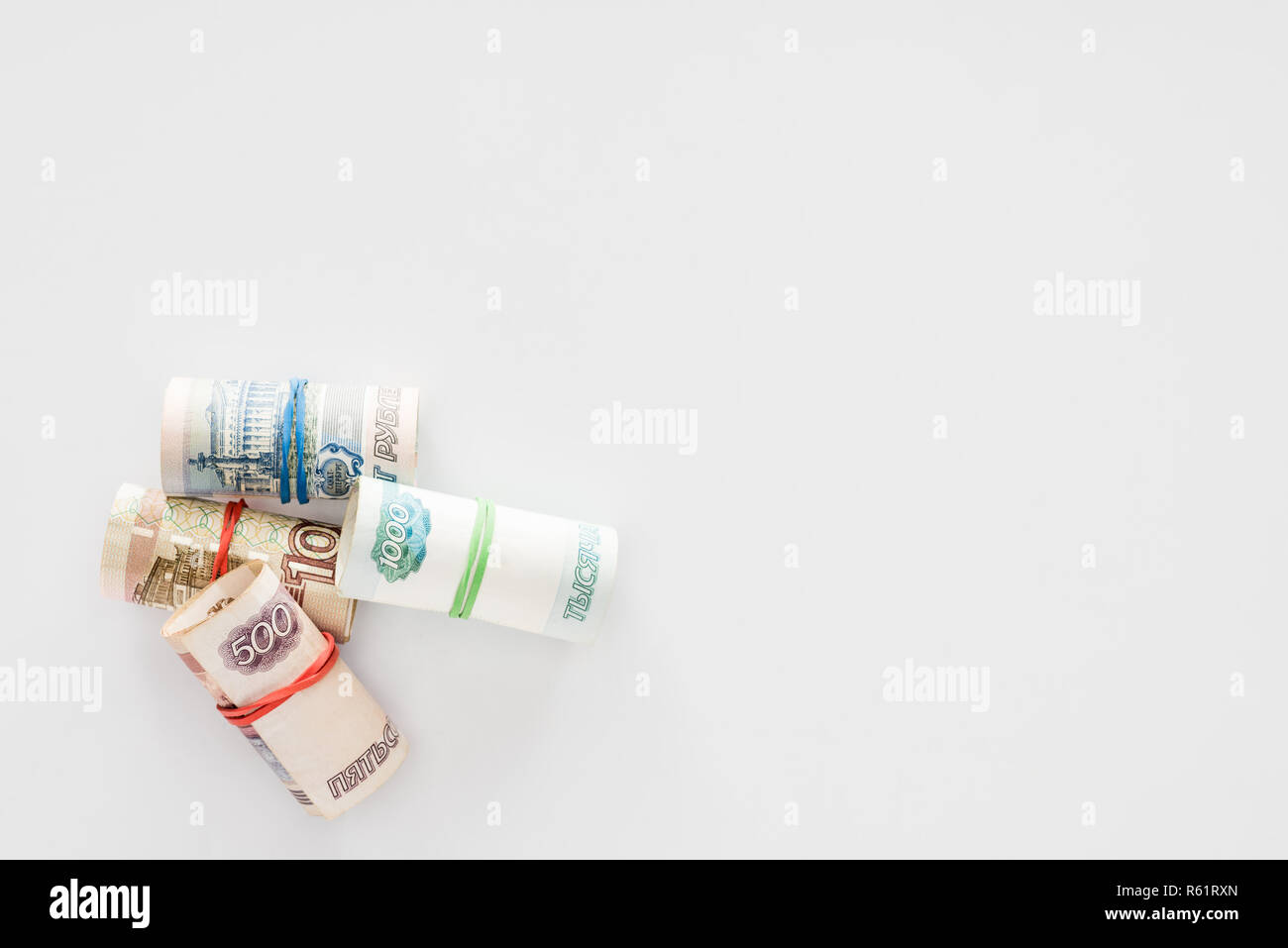top view of various russian rolled banknotes on white surface Stock ...