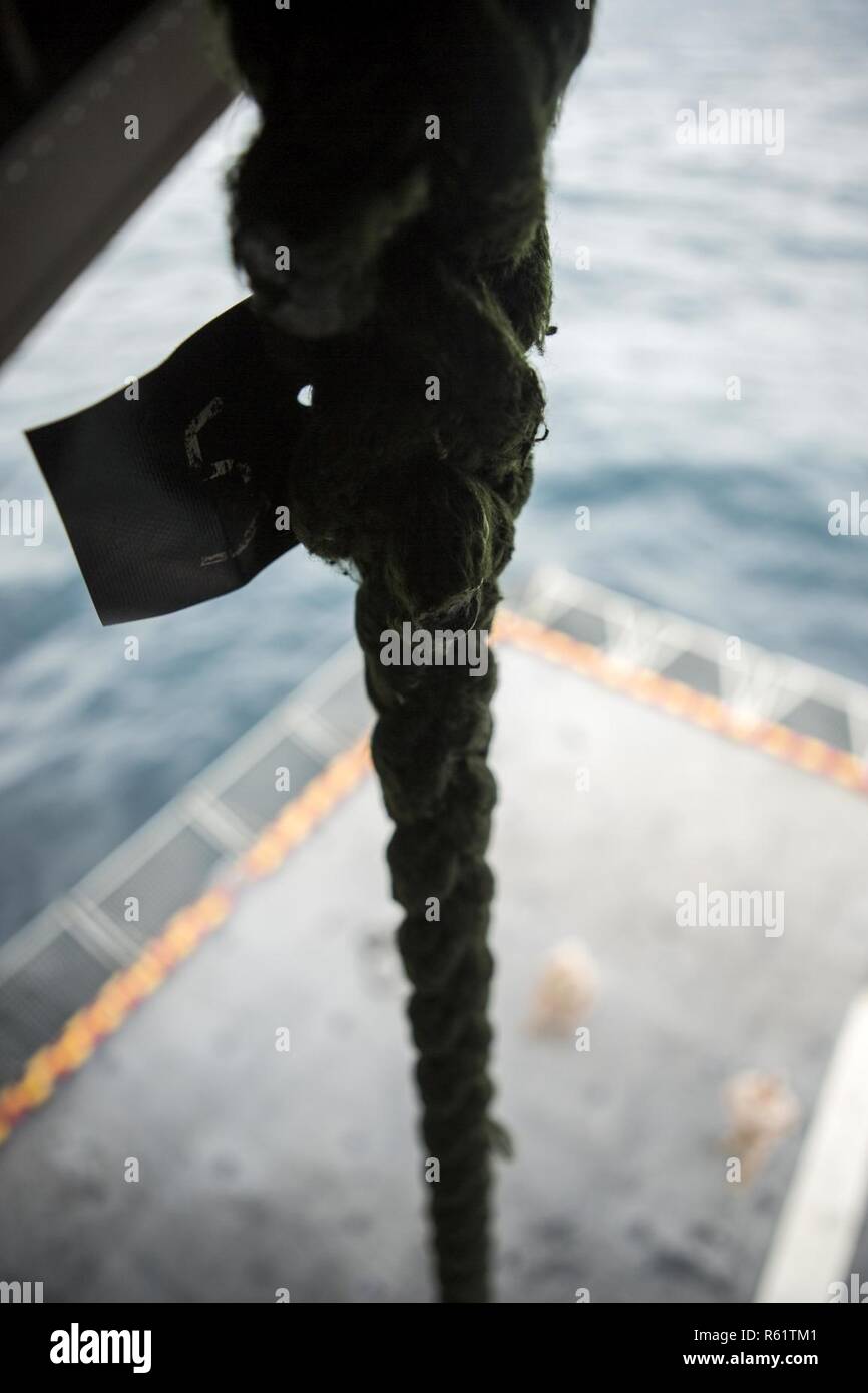 ARABIAN GULF – A rope is suspended out of an MV-22B Osprey from Marine ...