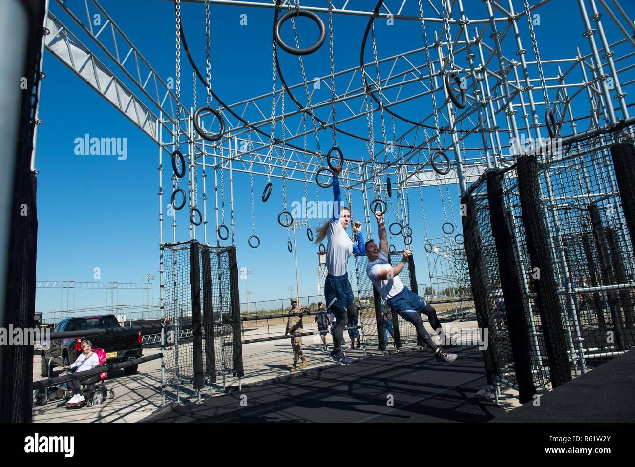 U.S. Air Force Airmen compete in a 32-obstacle course during the Alpha ...