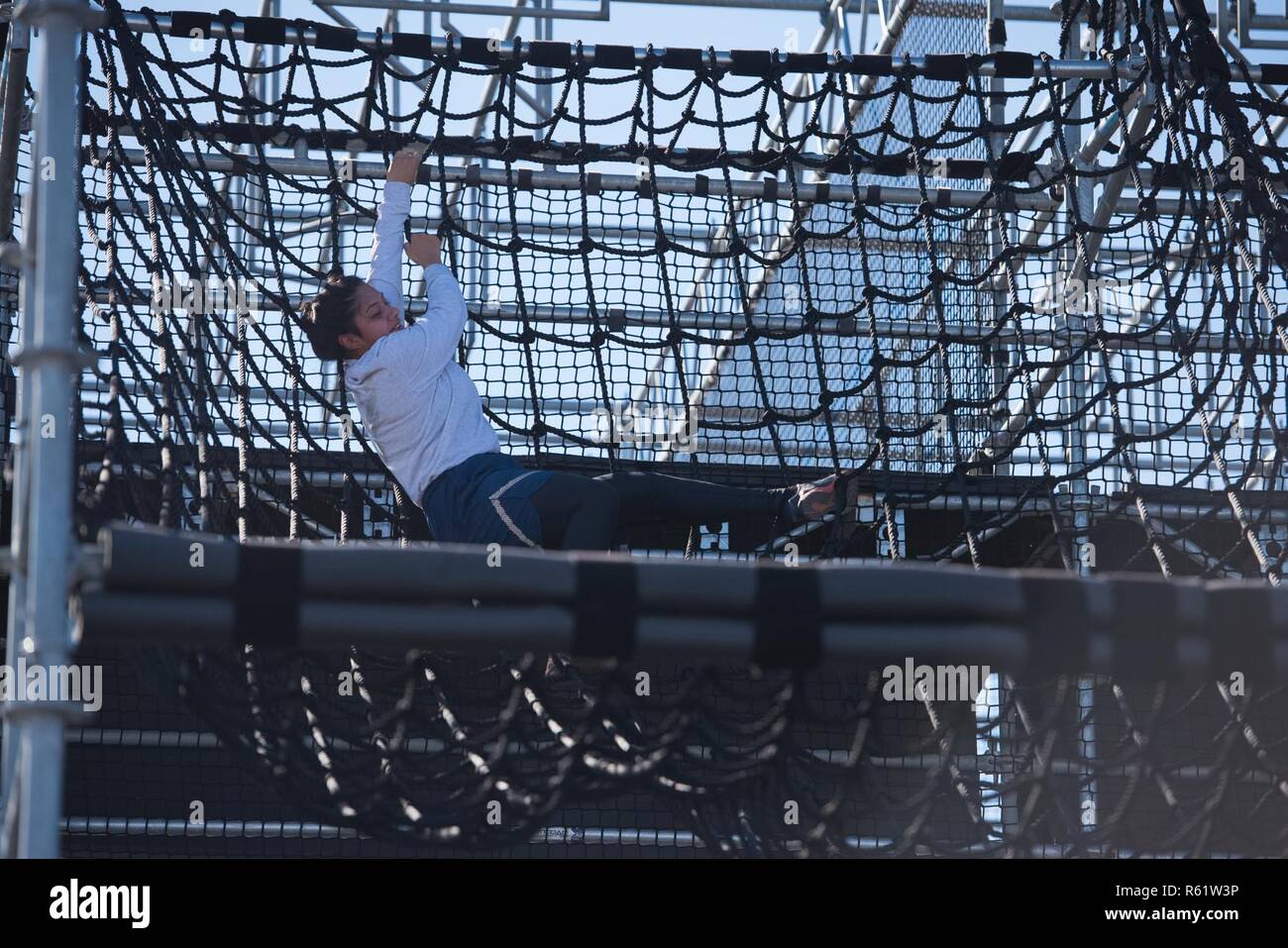 U.S. Air Force Airmen compete in a 32-obstacle course during the Alpha ...