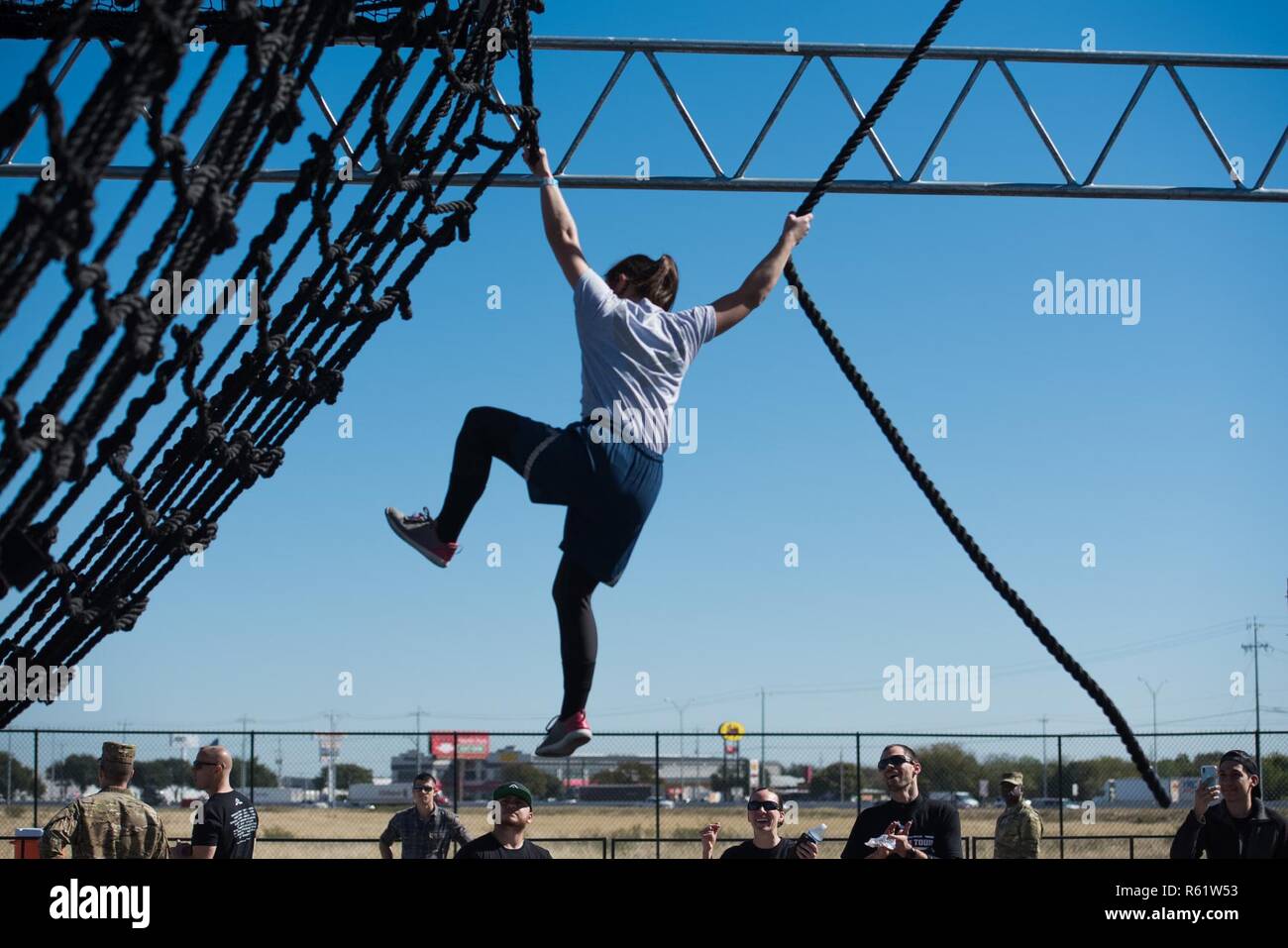 U.S. Air Force Airmen compete in a 32-obstacle course during the Alpha ...