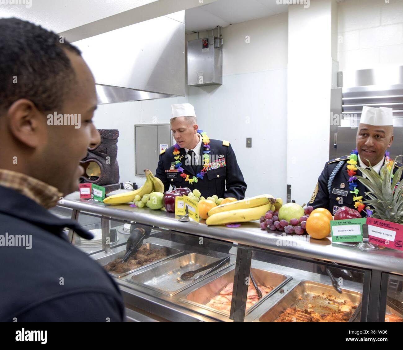 Col. Sean Fisher (middle), Fort Wainwright garrison commander, and ...