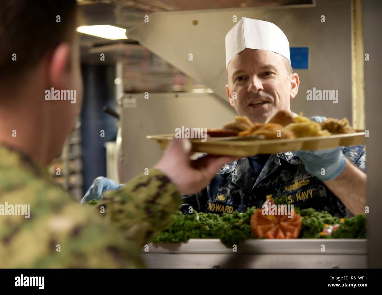 SASEBO, Japan (Nov. 22, 2018) - Capt. Colby Howard, commanding officer ...