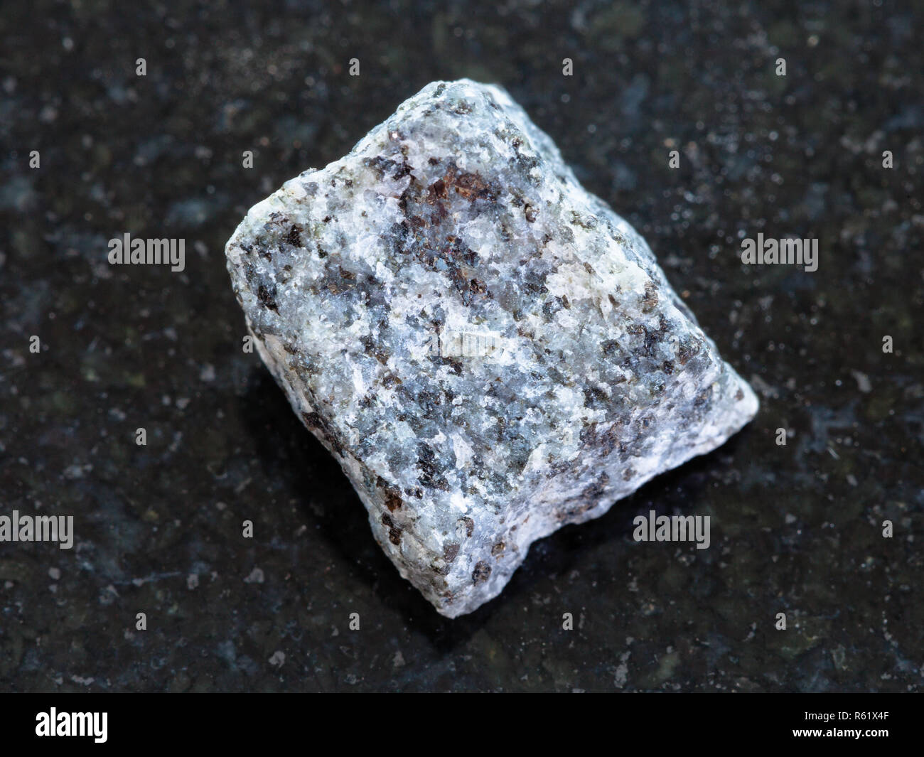 raw Gabbro stone on dark background Stock Photo - Alamy