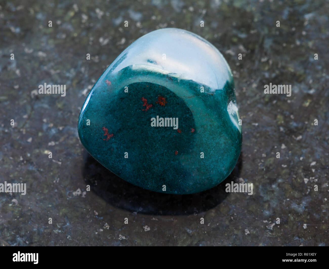 Macro shooting of natural mineral stone polished heliotrope bloodstone ...
