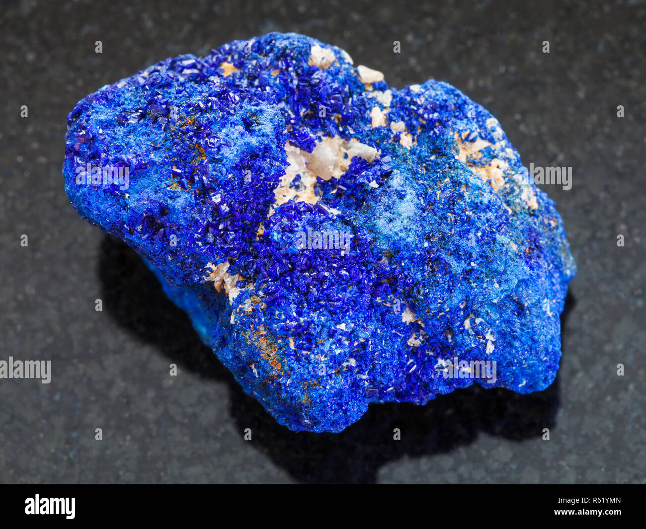 raw crystalline Azurite stone on dark background Stock Photo - Alamy
