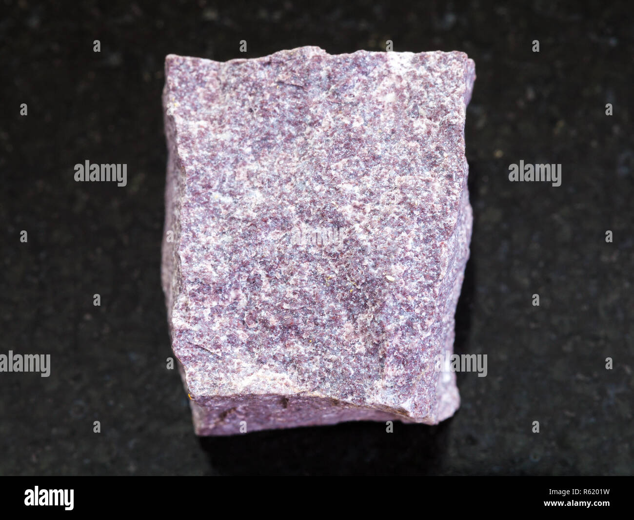 raw Alunite stone on dark background Stock Photo - Alamy