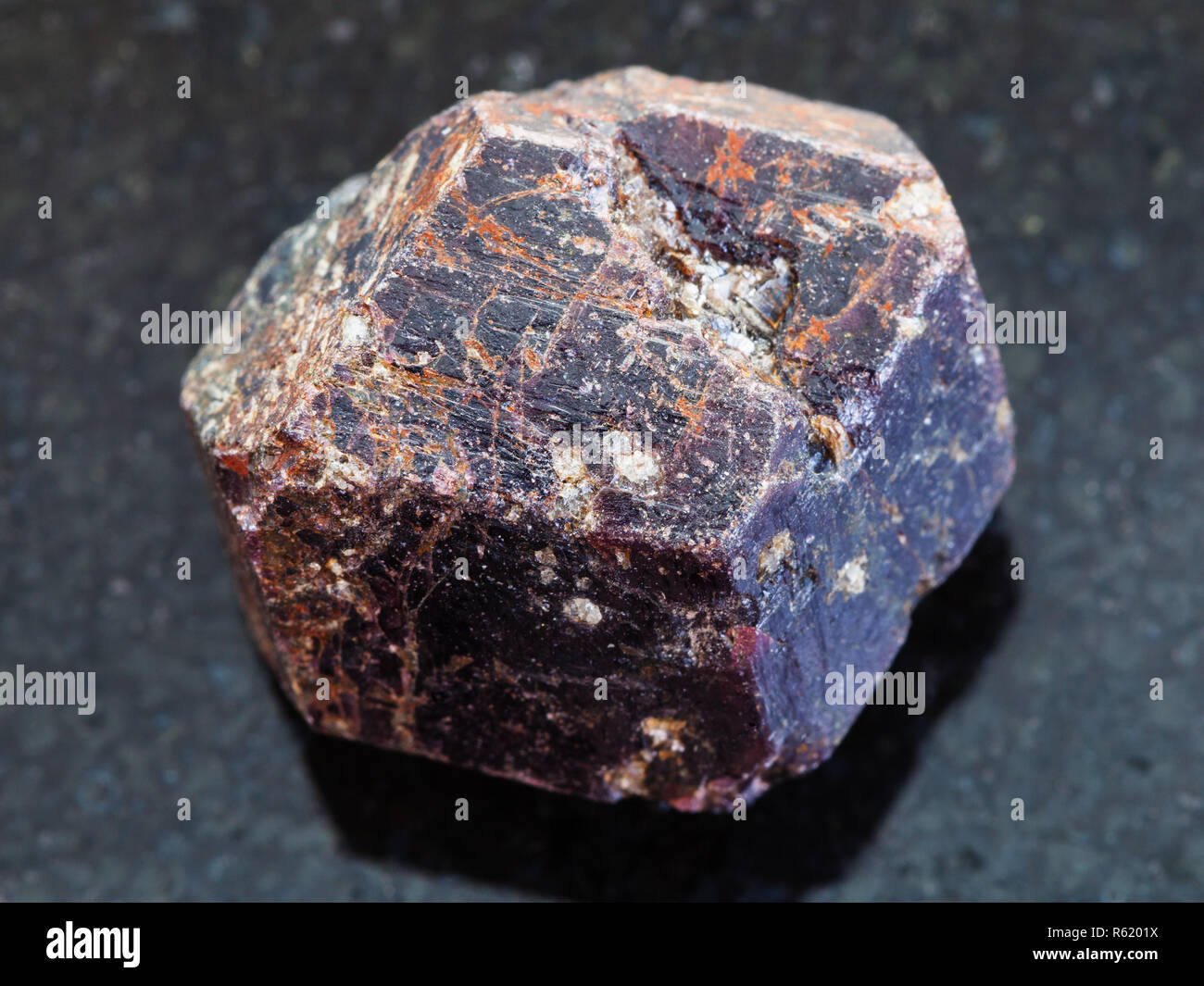 raw crystal of dravite tourmaline gemstone on dark Stock Photo - Alamy