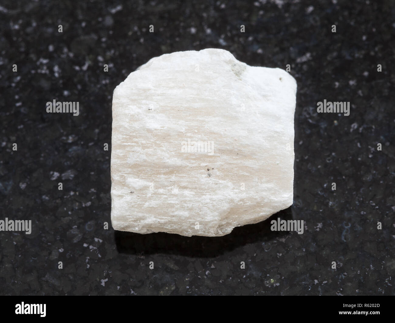white Gypsum stone on dark background Stock Photo - Alamy