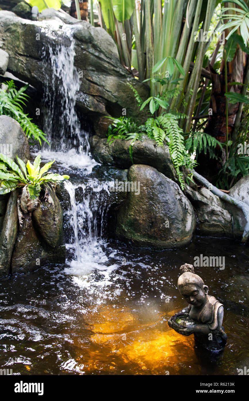 fountain statue rocks cascade Stock Photo - Alamy