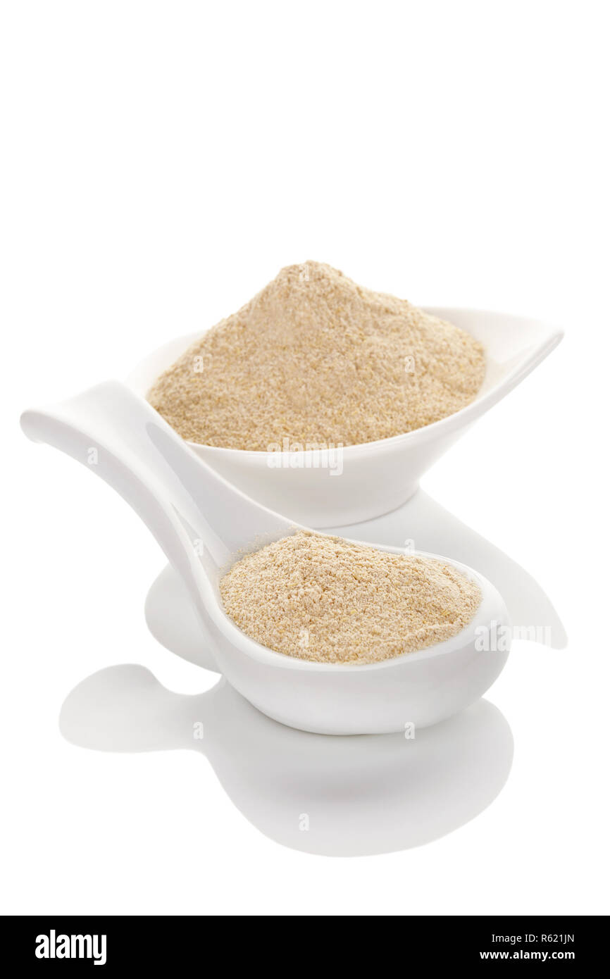 Ashwagandha powder on white background Stock Photo - Alamy
