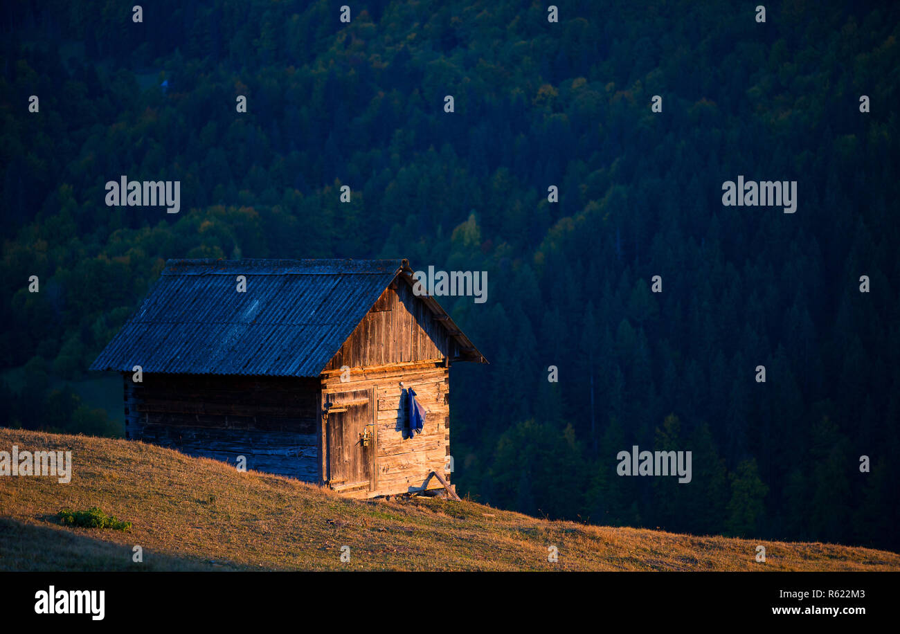 small house on the hill Stock Photo - Alamy