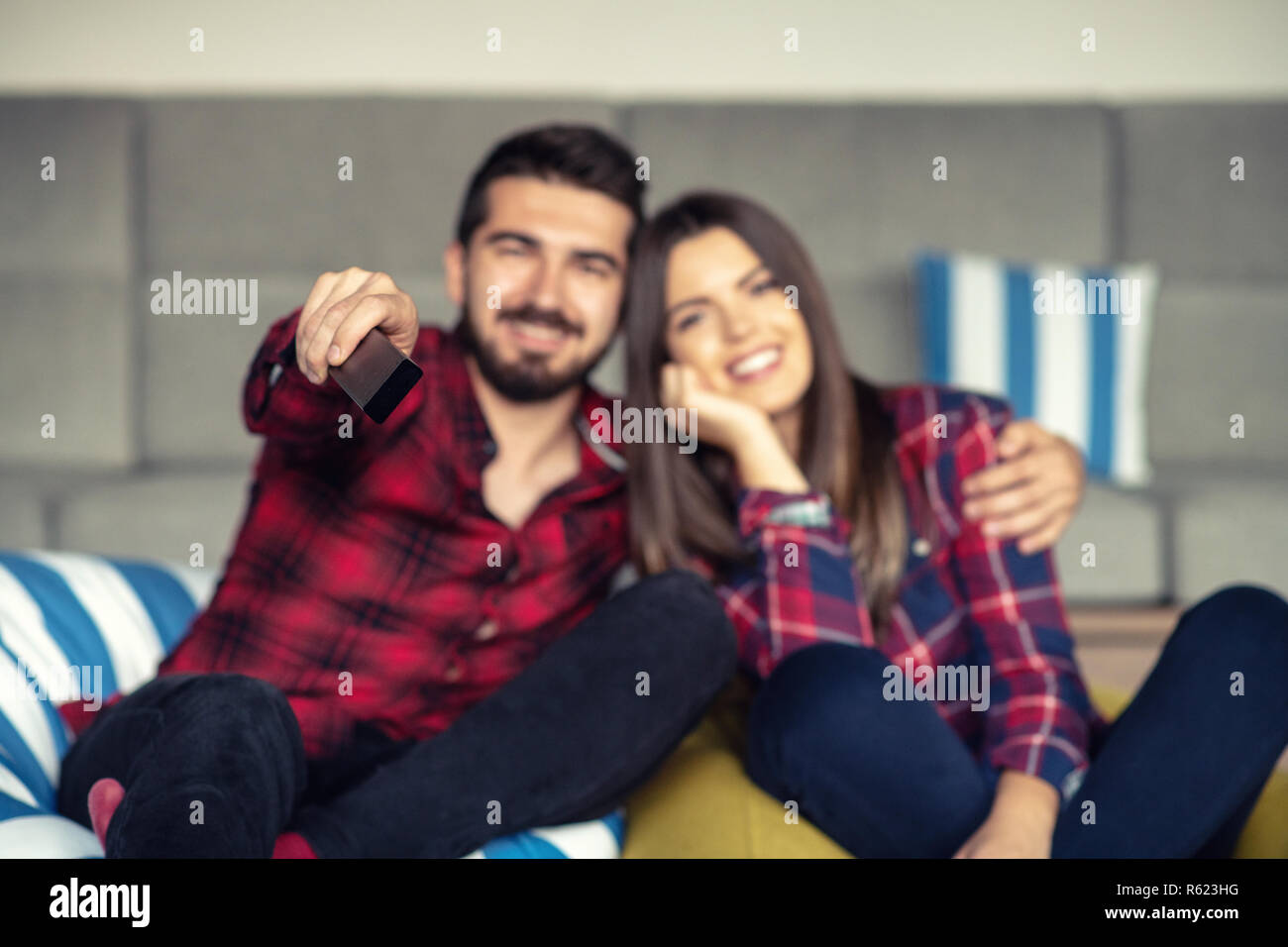 Fighting for the tv remote hi-res stock photography and images - Alamy