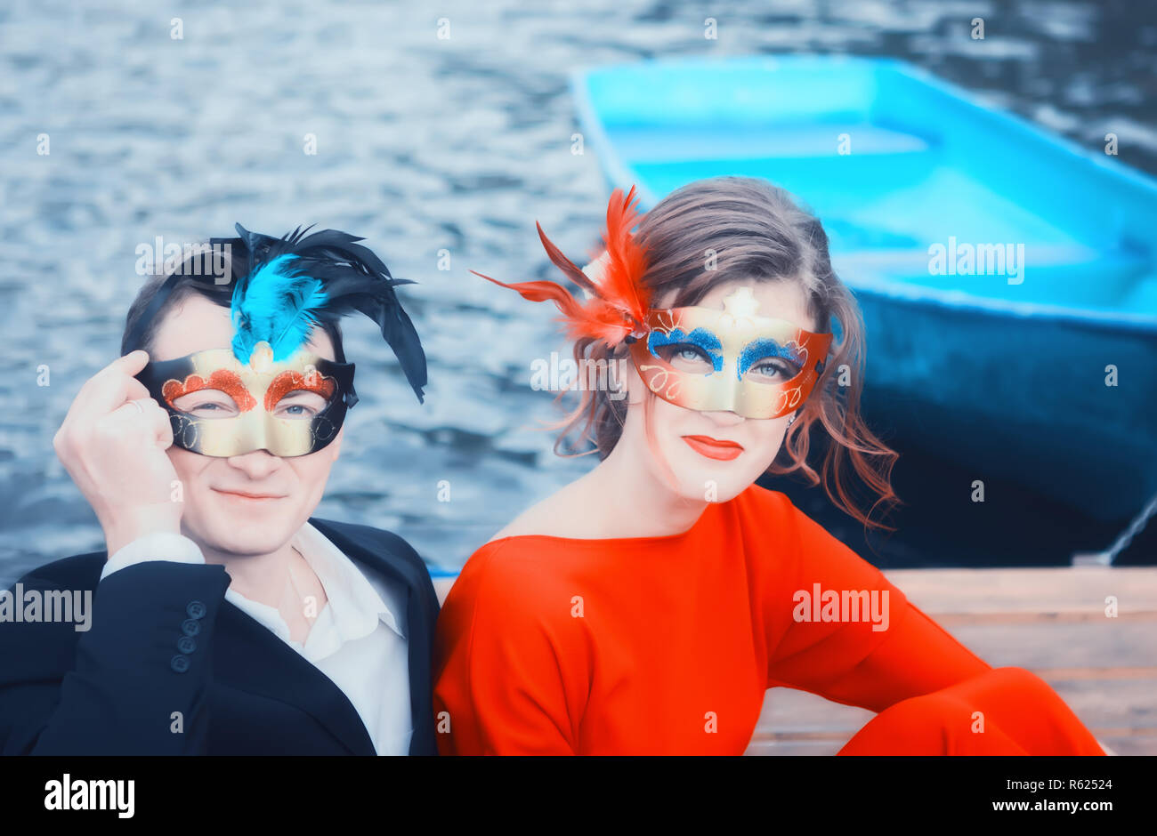 Beautiful Couple In Masquerade Masks Stock Photo - Alamy