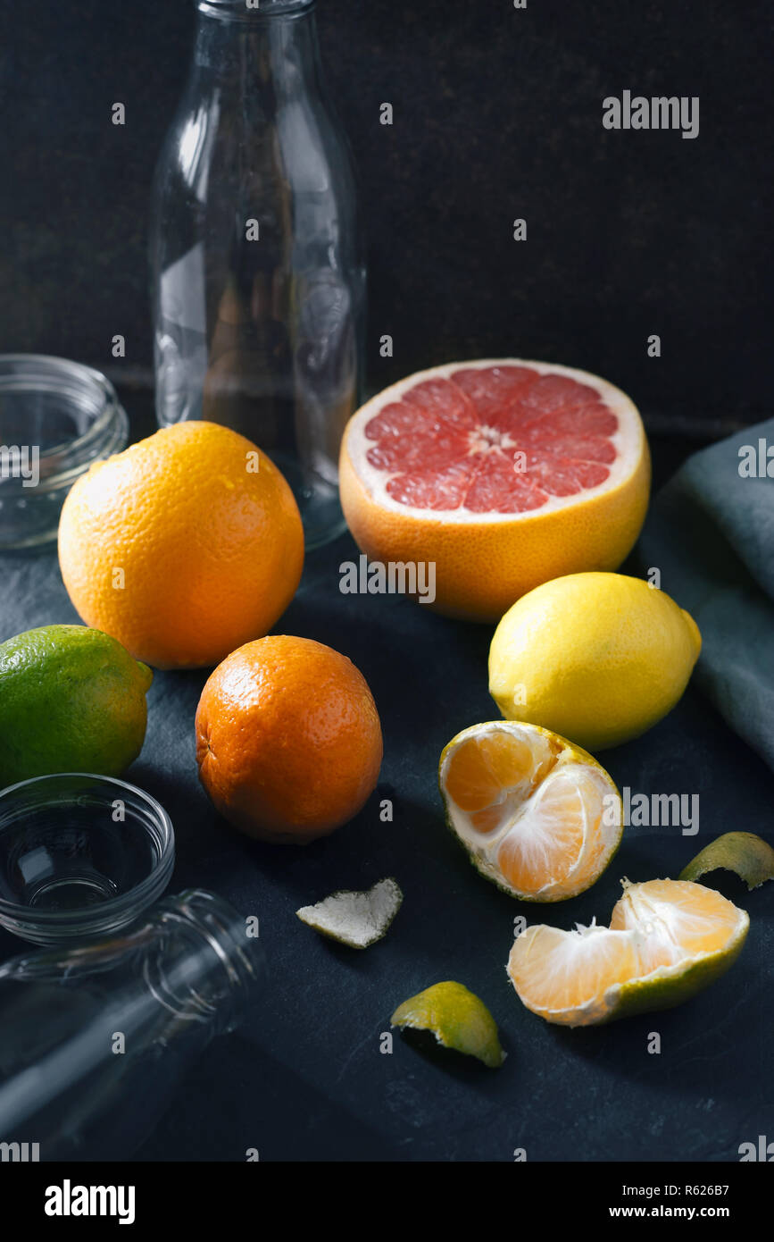 Citrus mix on the white wooden table top view Stock Photo - Alamy
