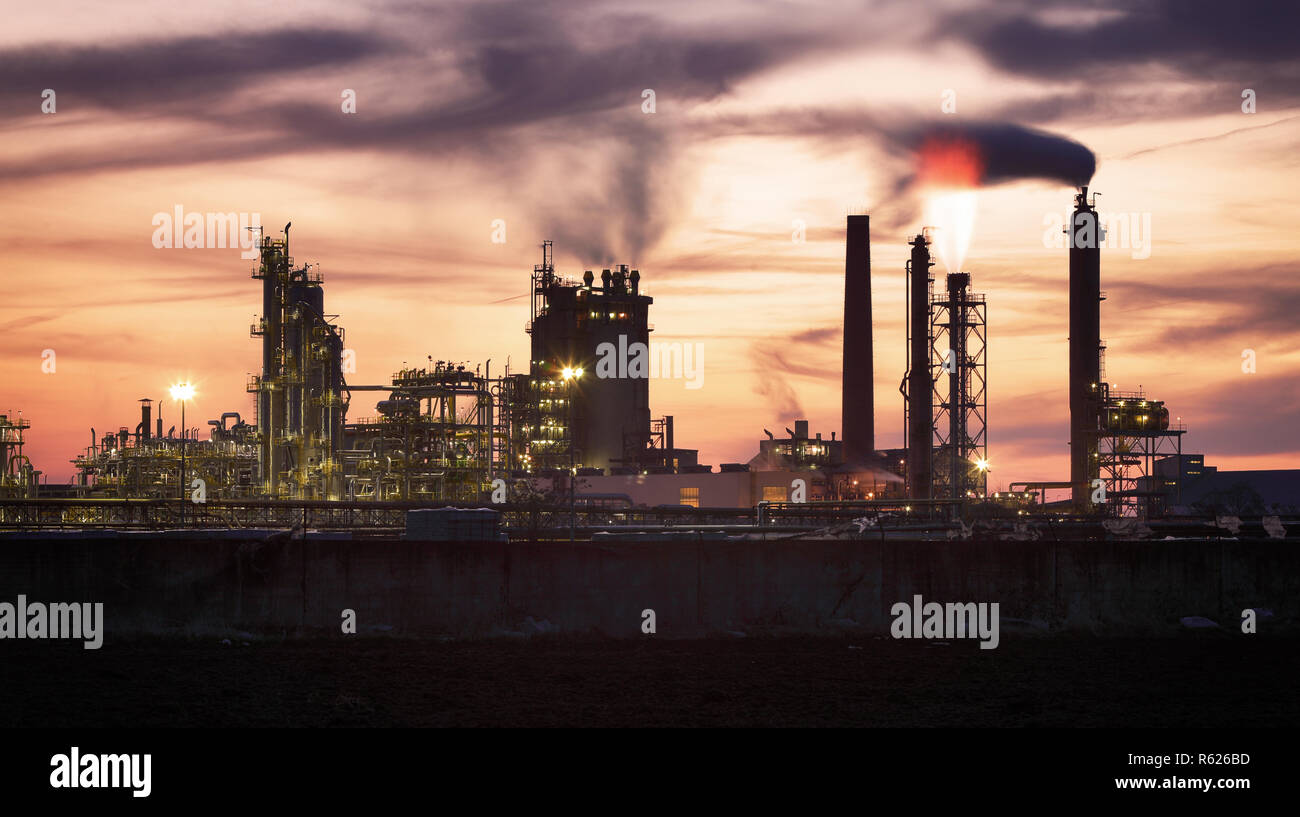 Factory with air pollution, Oil industry Stock Photo - Alamy