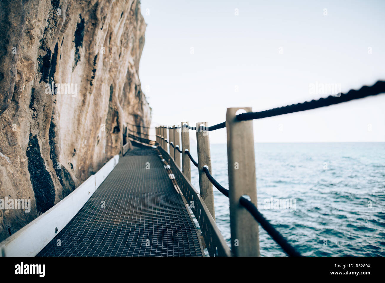 Blue sea stone dock background hi-res stock photography and images - Alamy