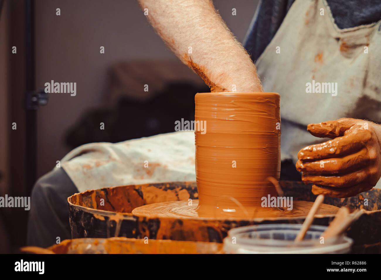 Potter makes clay vessel hi-res stock photography and images - Alamy