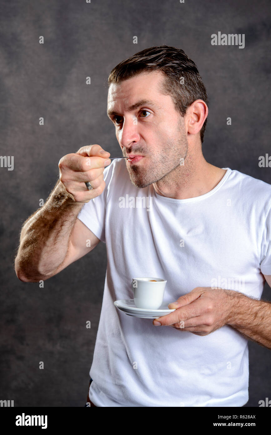 Portrait laughing man drinking espresso hi-res stock photography and ...