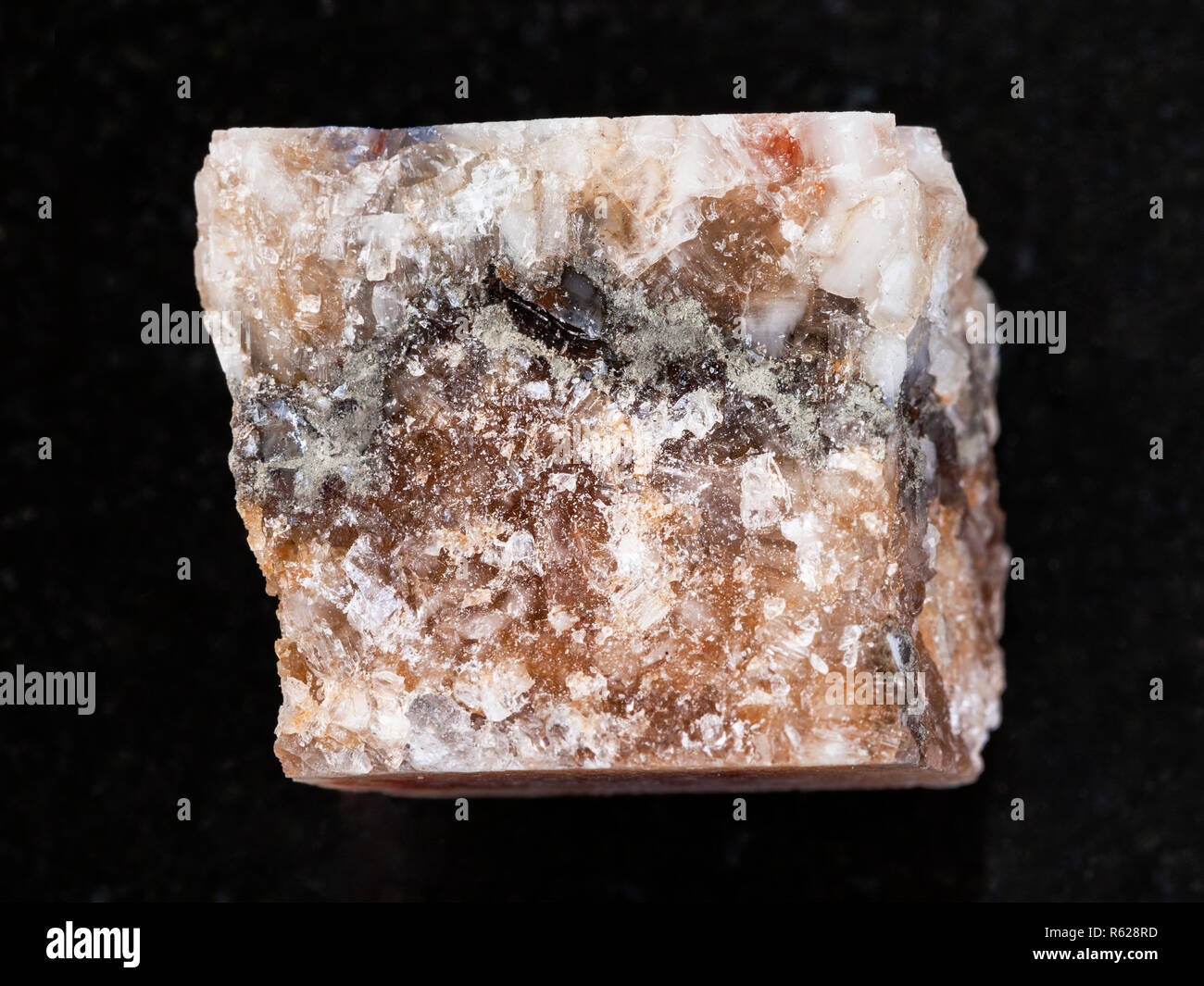 raw rock salt on dark background Stock Photo - Alamy