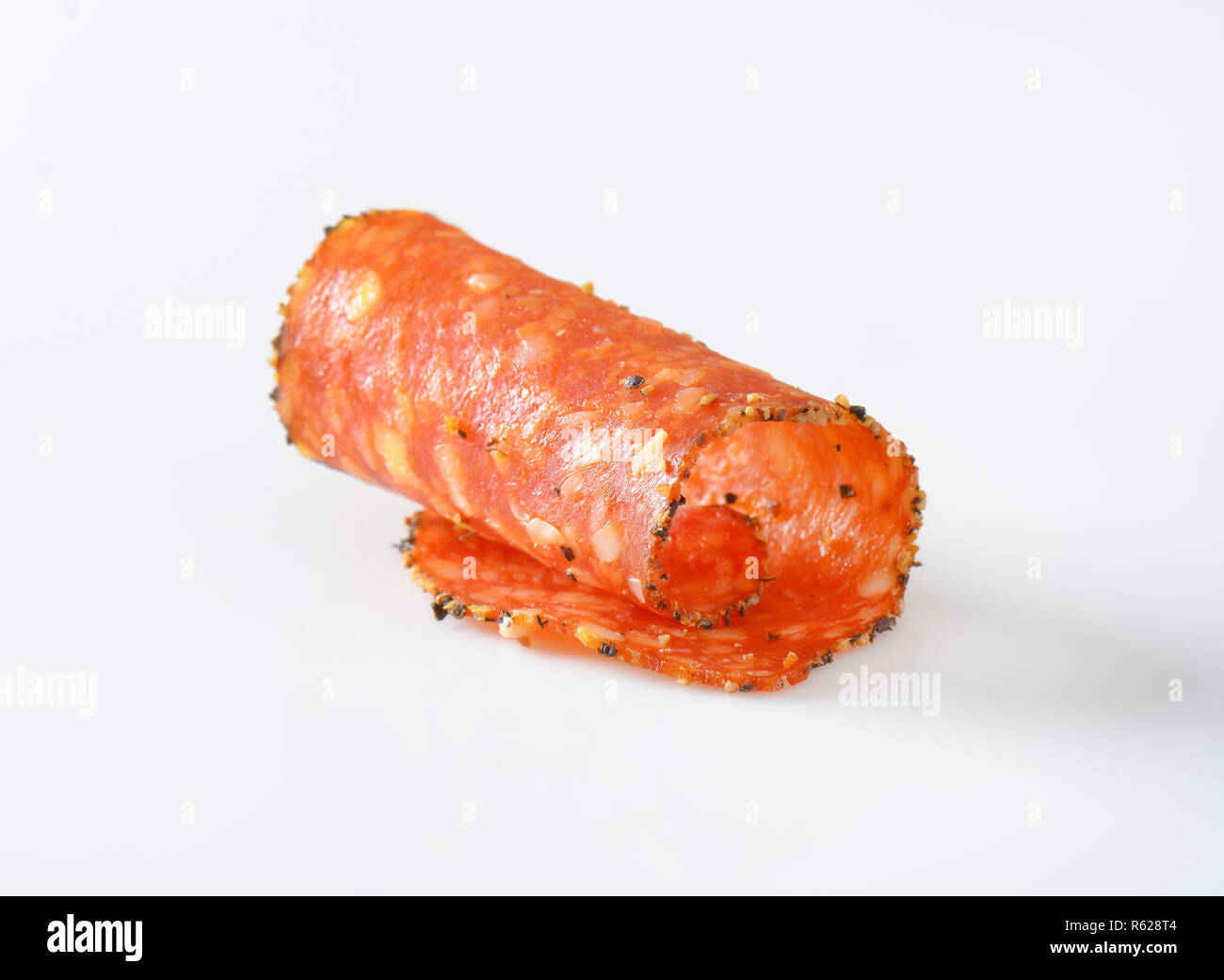 Black pepper-coated salami with cheese Stock Photo - Alamy