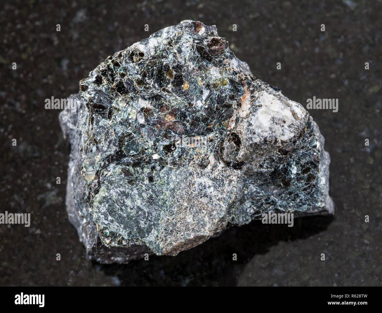 raw Magnetite ore on dark background Stock Photo - Alamy