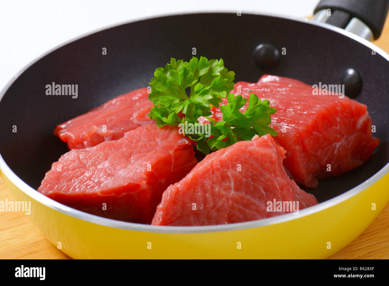 diced raw beef Stock Photo - Alamy