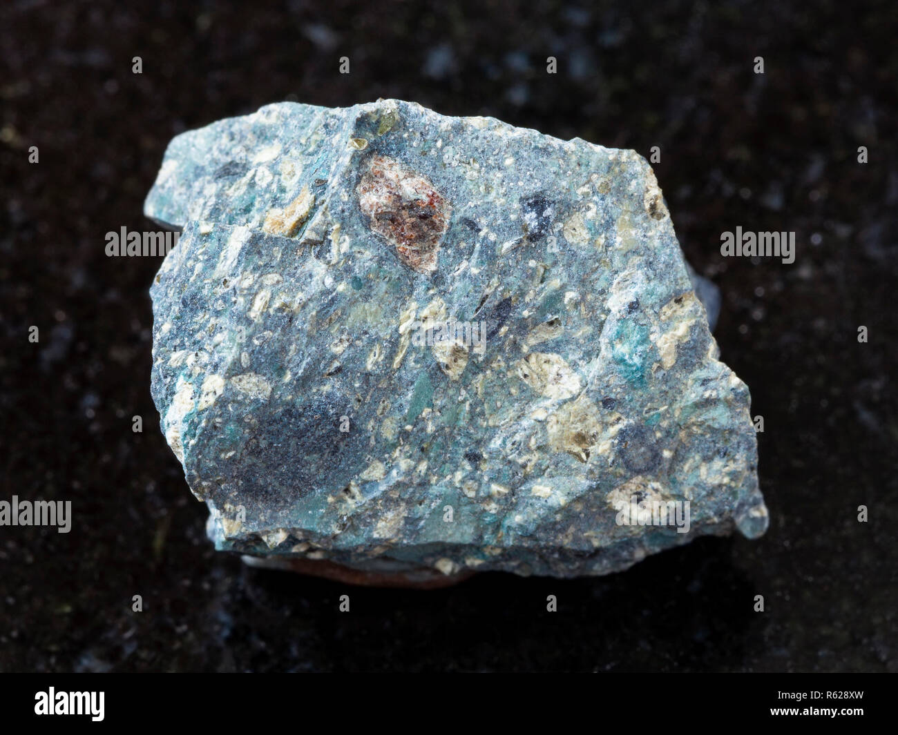 raw Kimberlite stone on dark background Stock Photo - Alamy