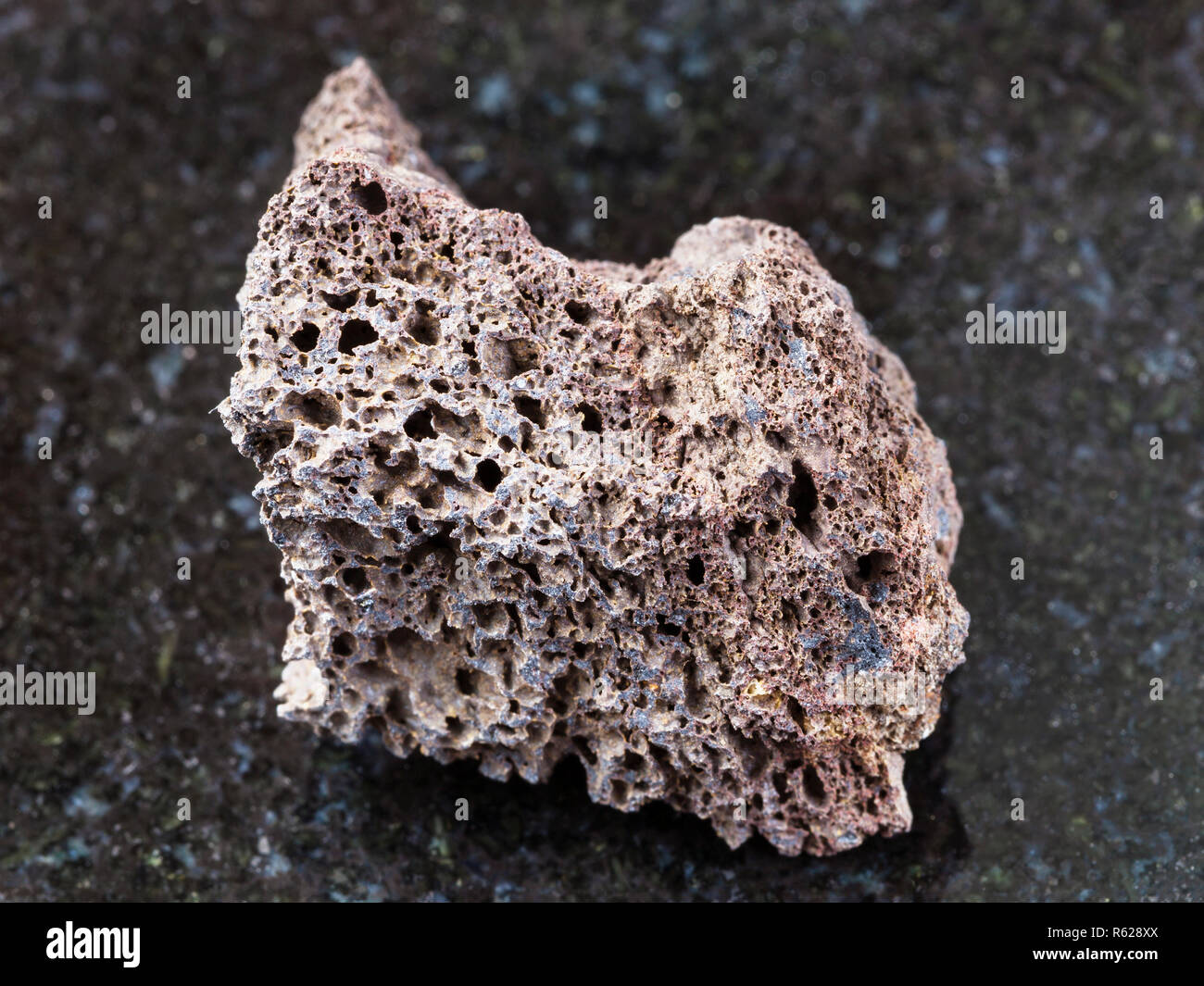 rough Pumice of basic composition stone on dark Stock Photo - Alamy