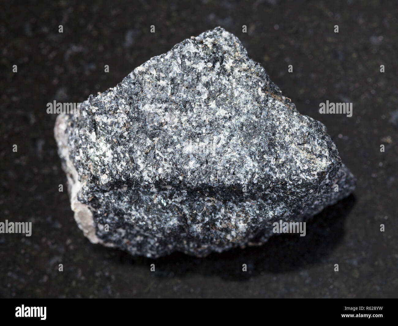 raw Amphibolite stone on dark background Stock Photo - Alamy