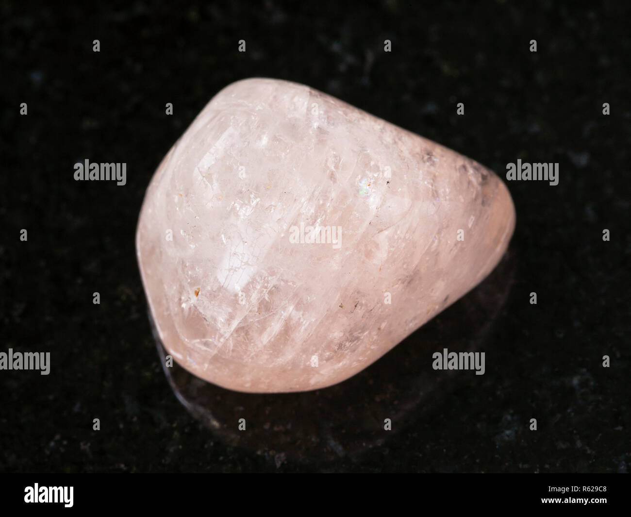 polished morganite (pink beryl) gemstone on dark Stock Photo - Alamy