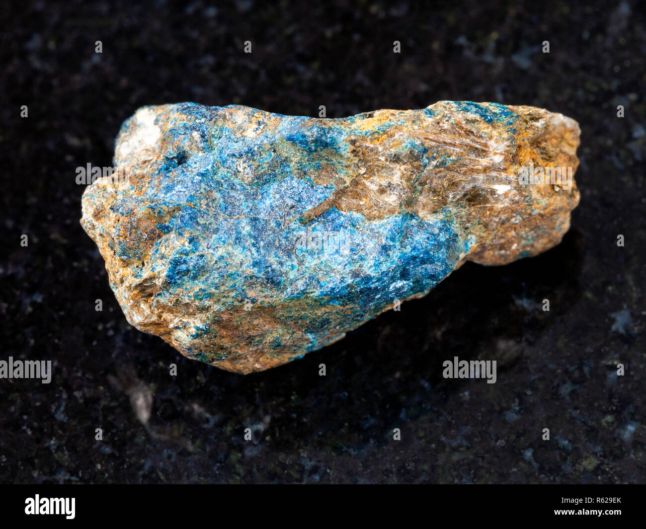 raw Lazulite stone on dark background Stock Photo - Alamy