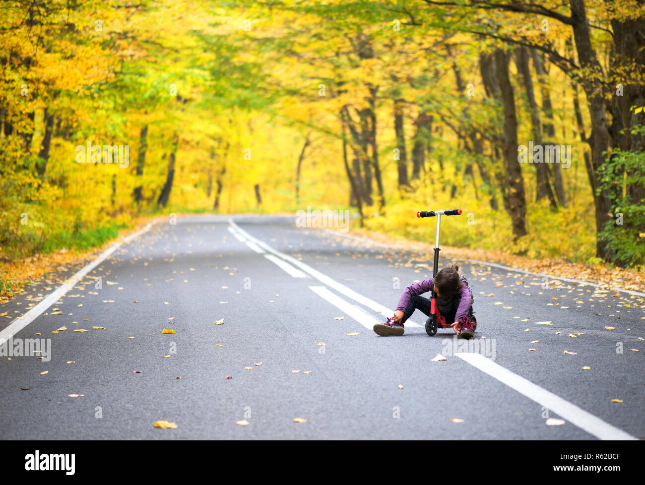 Child falling leaves hi-res stock photography and images - Alamy