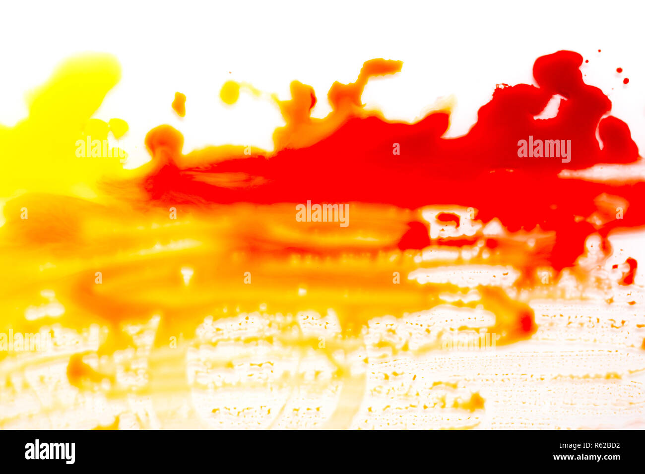 a spot of red paint on a white background. stain and spray Stock Photo ...