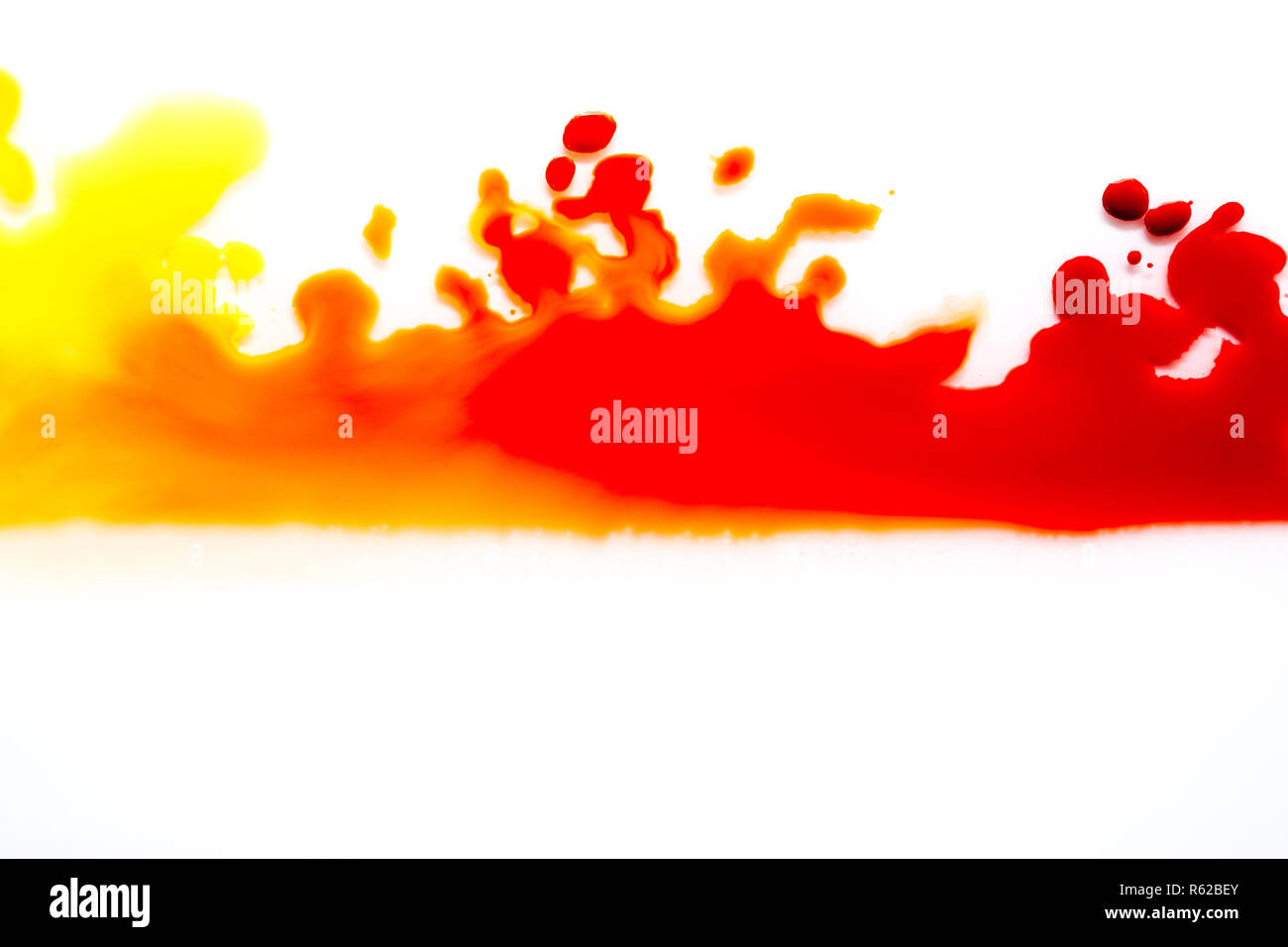 a spot of red paint on a white background. stain and spray Stock Photo ...