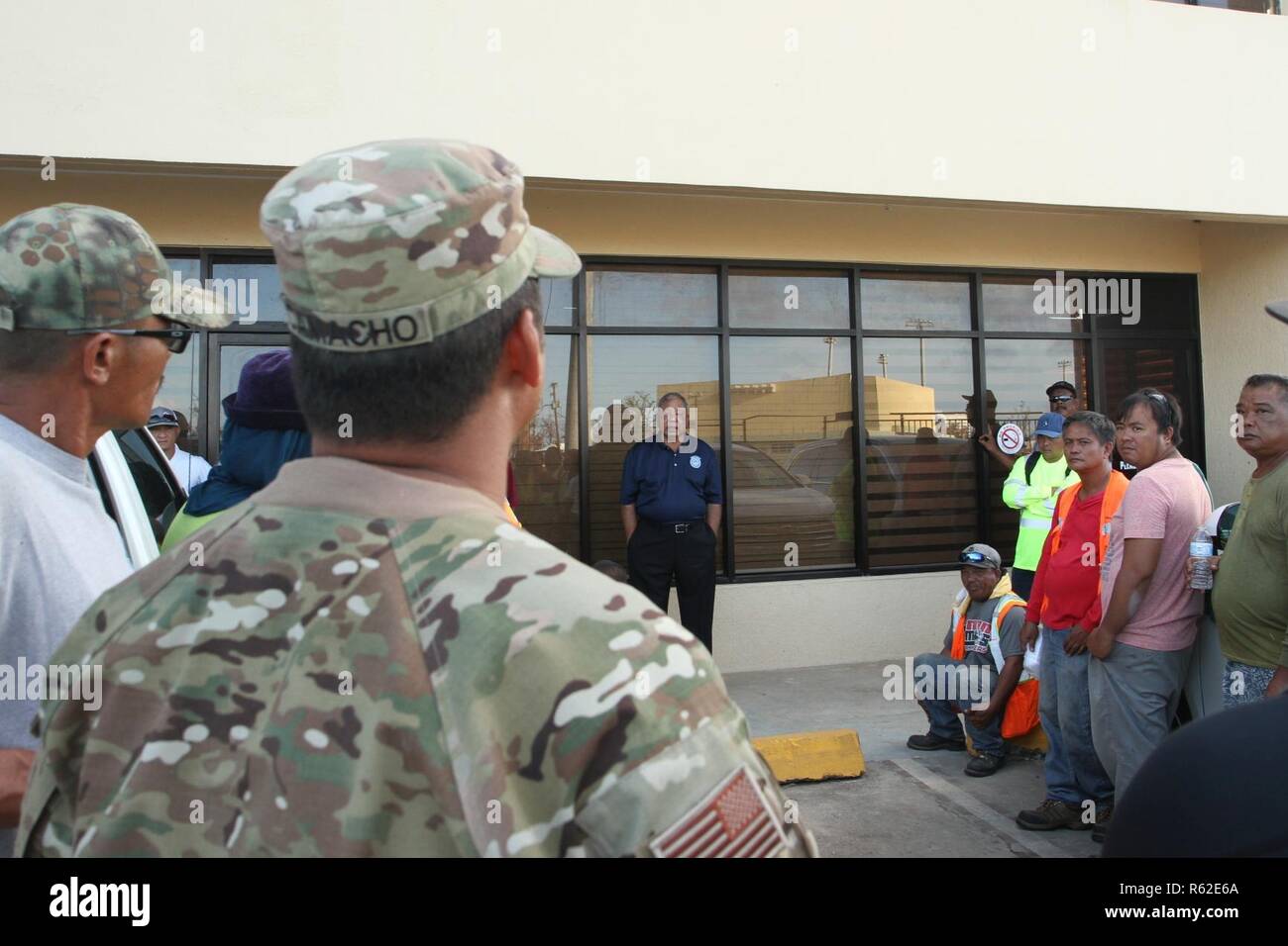Saipan Mayor David Apatang, center, addresses his staff and U.S. Army ...