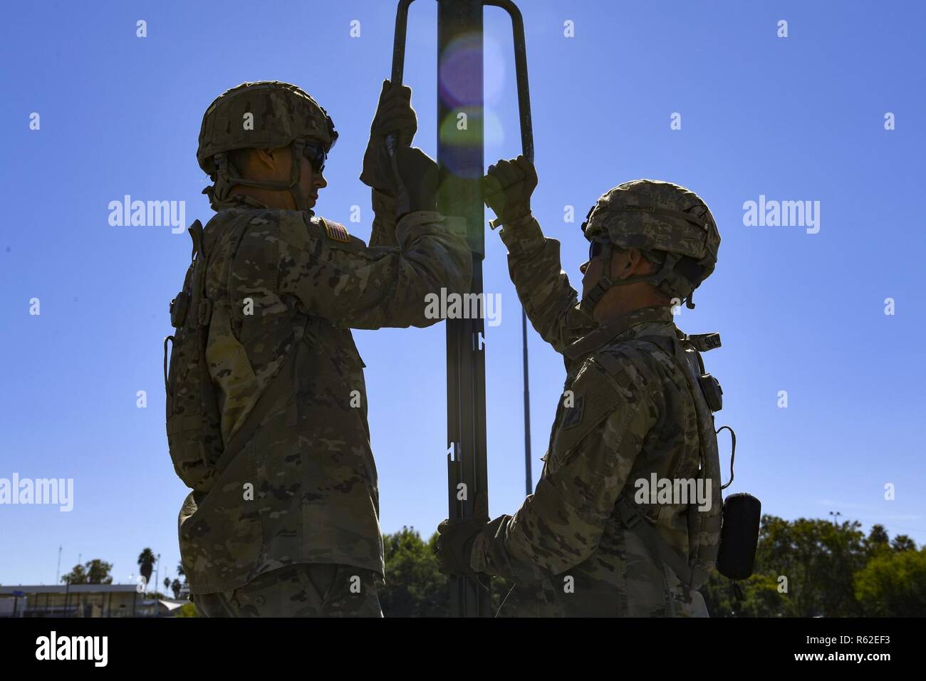 U.S. Army Soldiers with the 541st Sapper Company set posts and apply ...