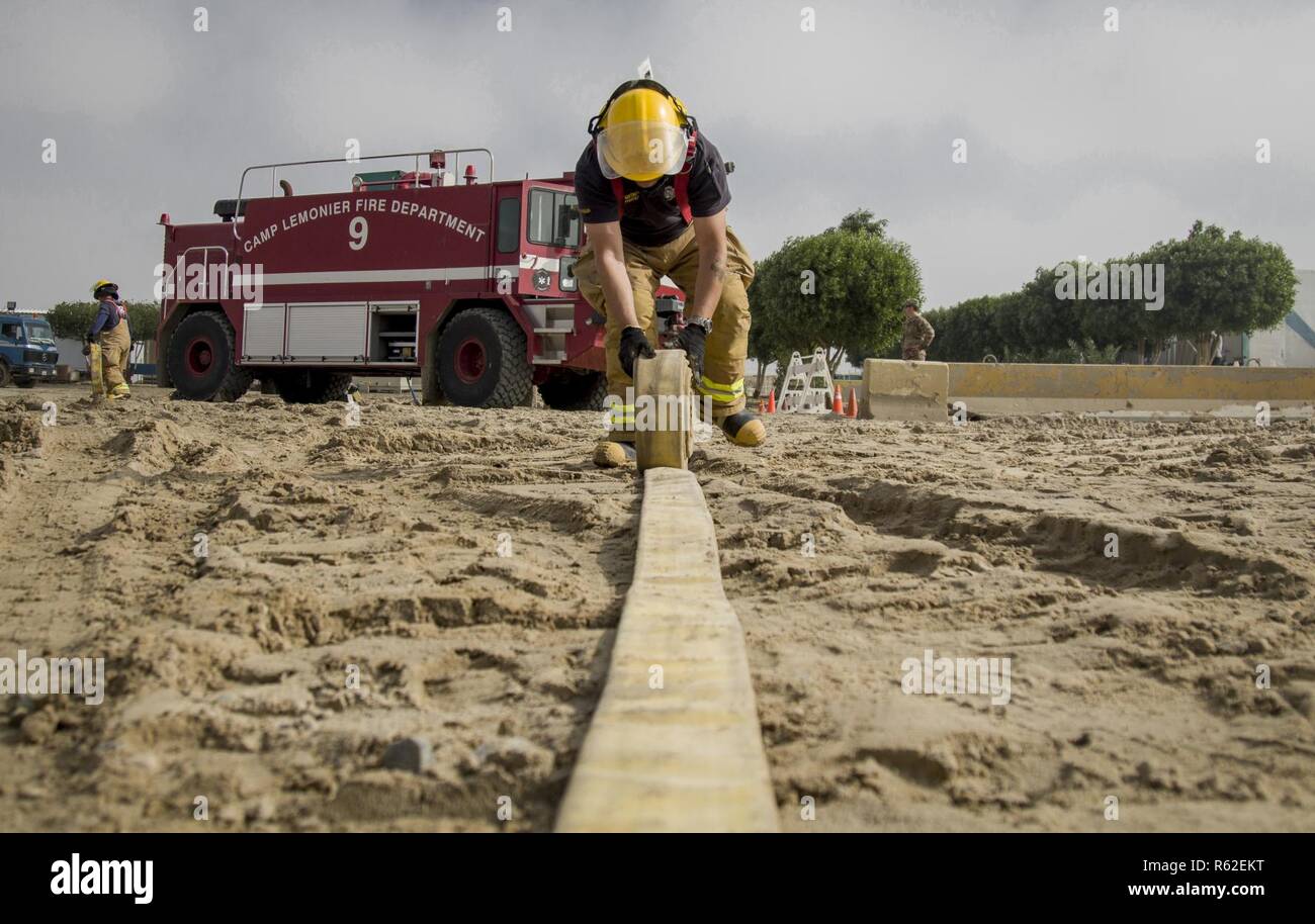 Firefighter Sejdi Mustafa, with Area Support Group - Kuwait Fire ...