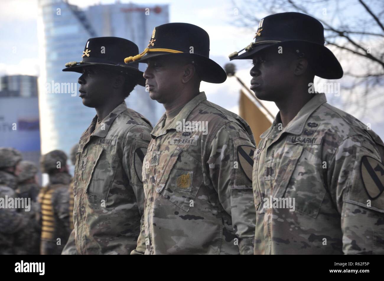 U.S. Army 1st Lt. Anna Traylor (left), Command Sgt. Maj. Tony Reese ...