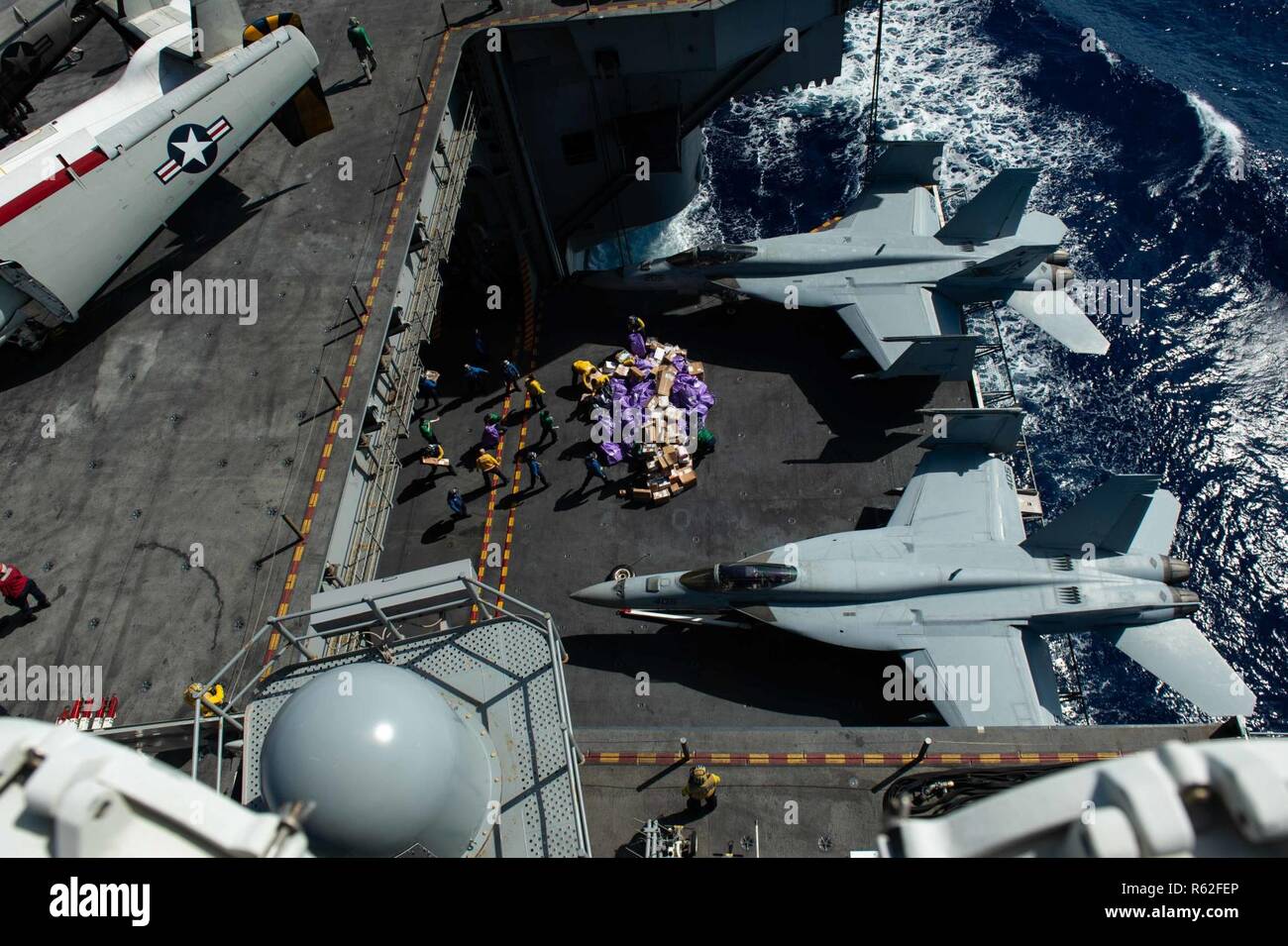 Call in the hangar bay aboard the nimitz class aircraft carrier hi-res ...
