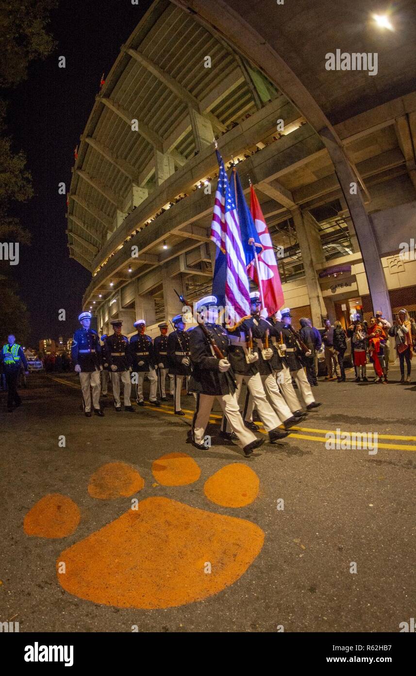 The Clemson University Army ROTC honor guard the Pershing Rifles leads ...