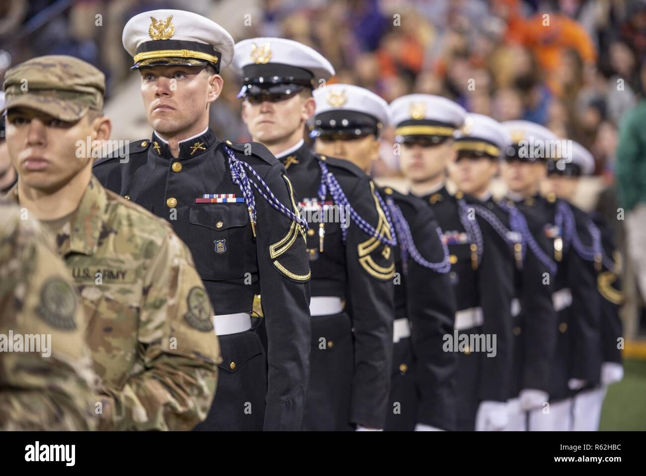 The Clemson University Army ROTC honor guard the Pershing Rifles stands ...