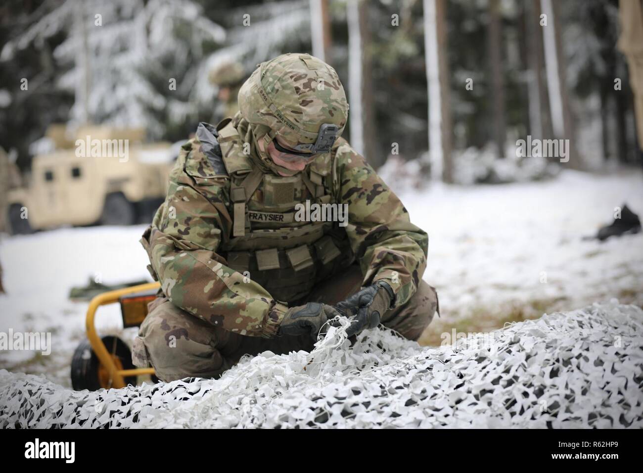 A U.S. Spc. Michaela Fraysier of the 1st Armored Brigade Combat Team ...