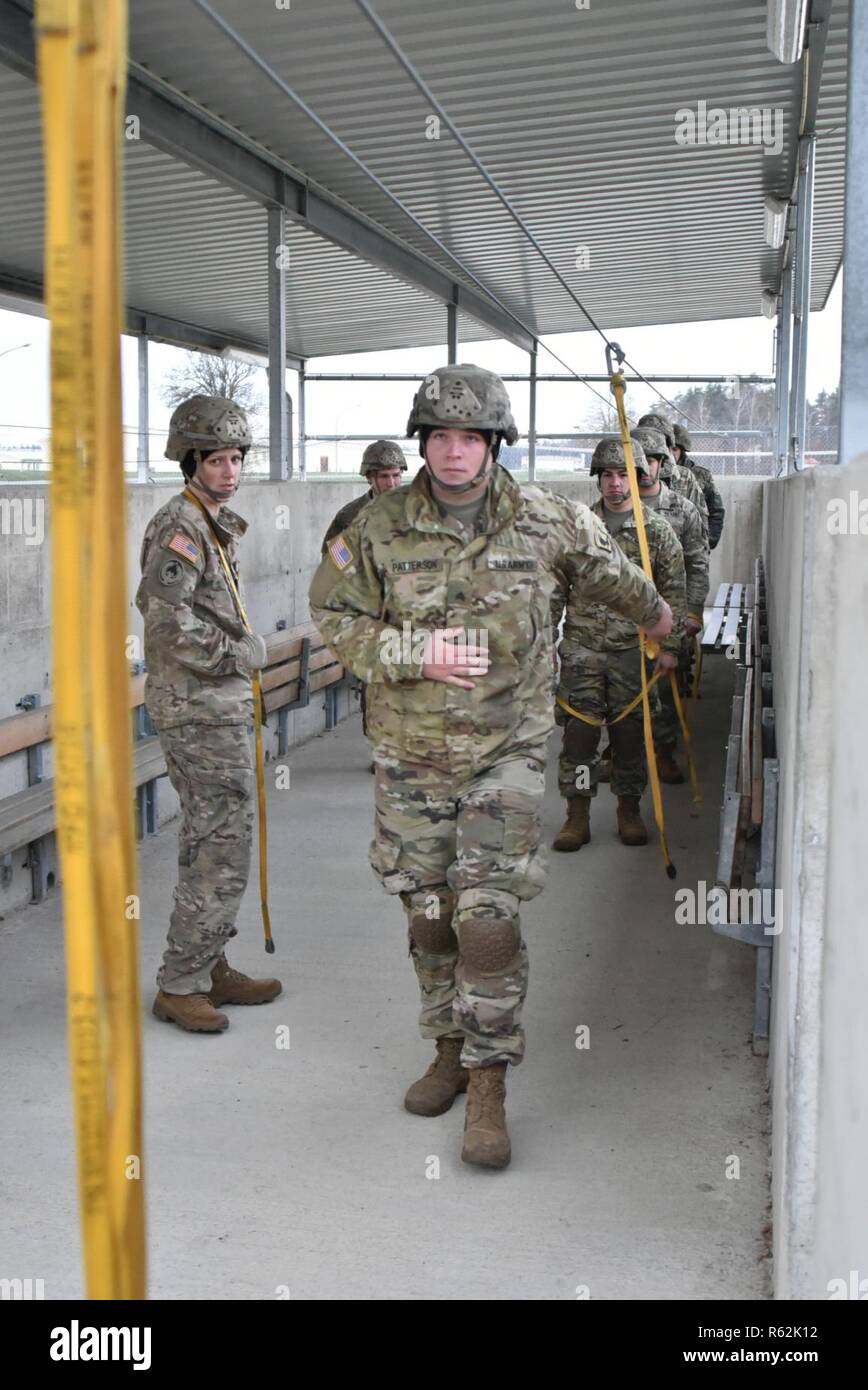 U.S. Paratroopers assigned to 4th Battalion, 319th Airborne Field Artillery Regiment, 173rd ...