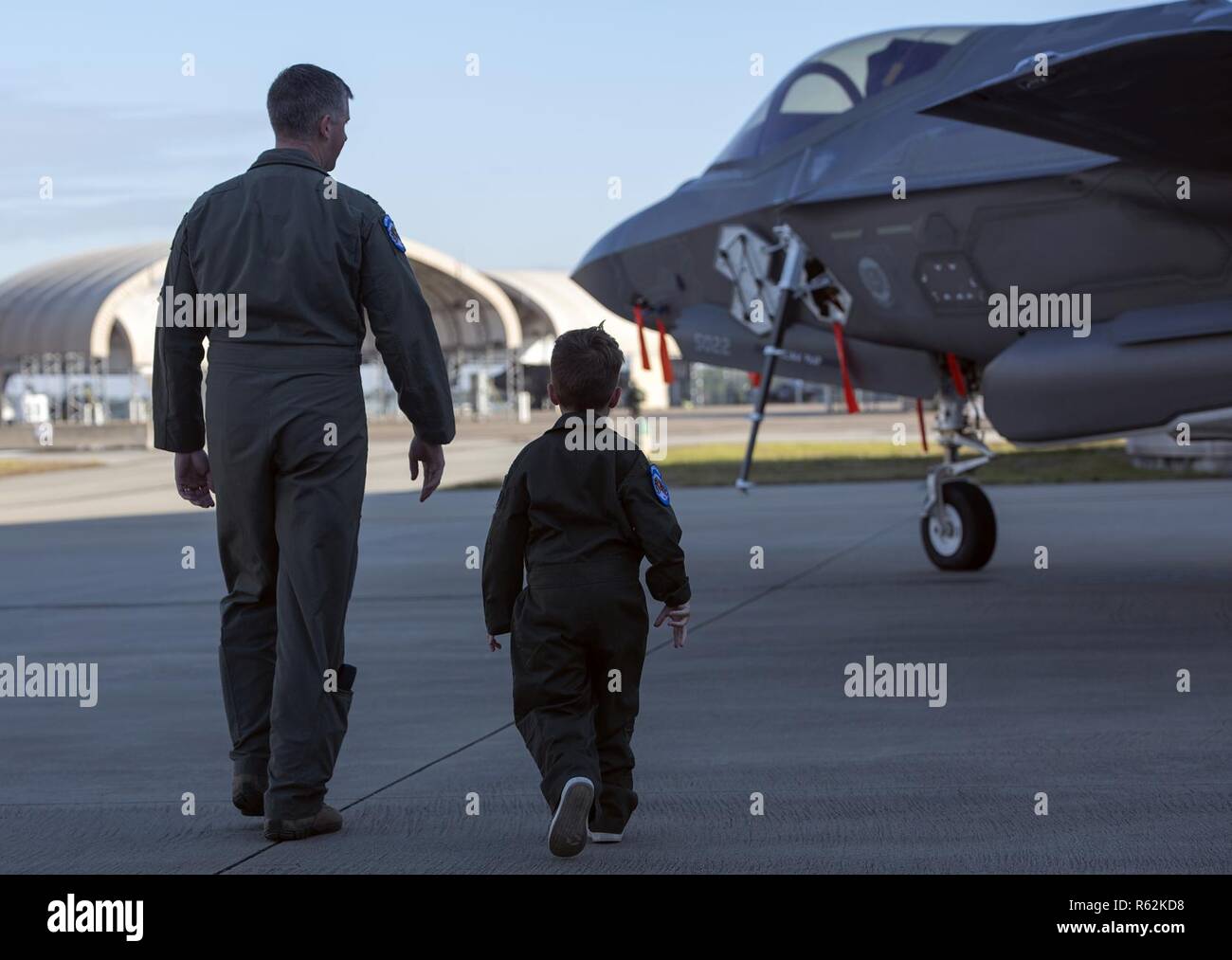 William Paap, 33rd Fighter Wing pilot for a day, walks alongside Capt ...
